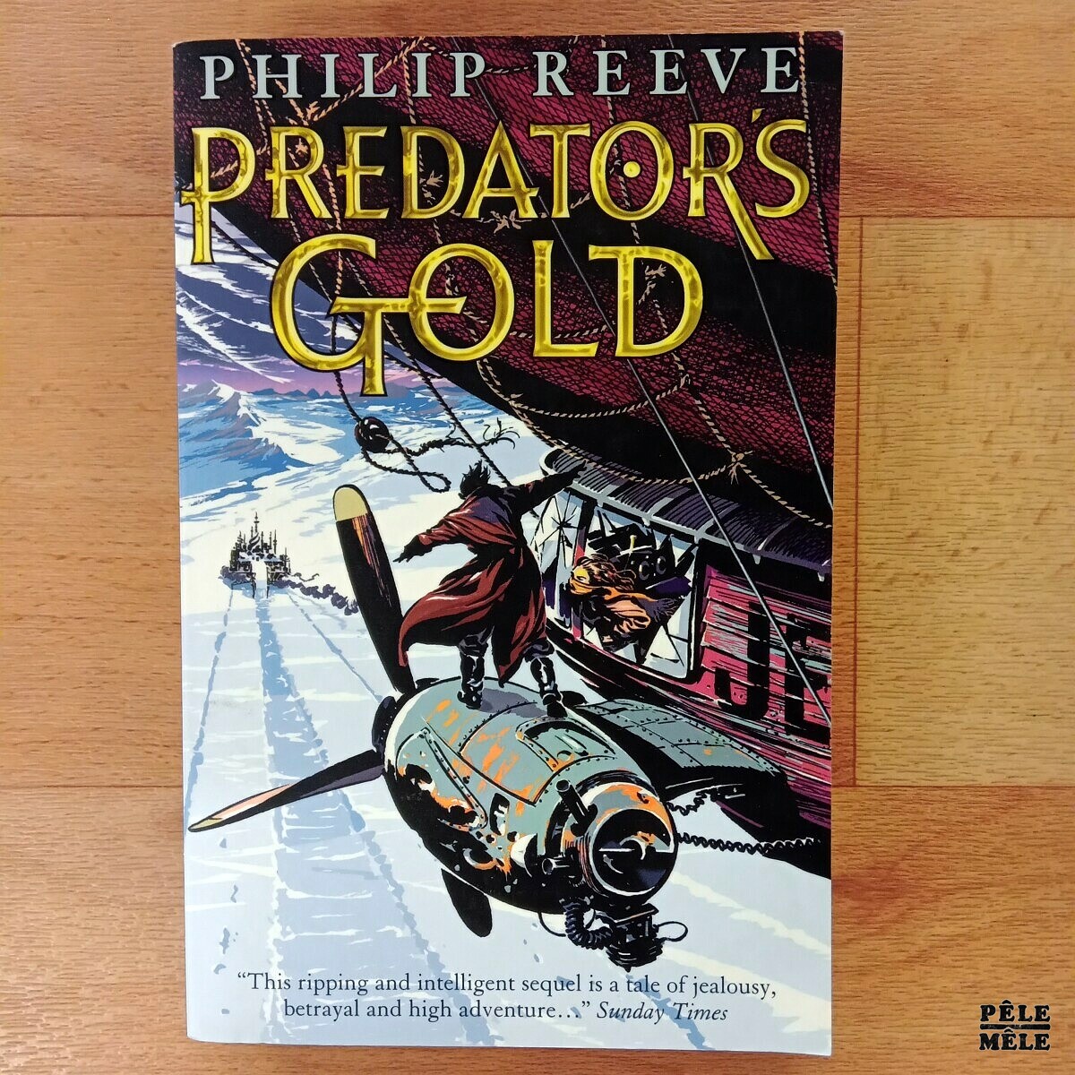 "Predator's Gold" - Philip Reeve (Scholastic) - Pêle-Mêle Online